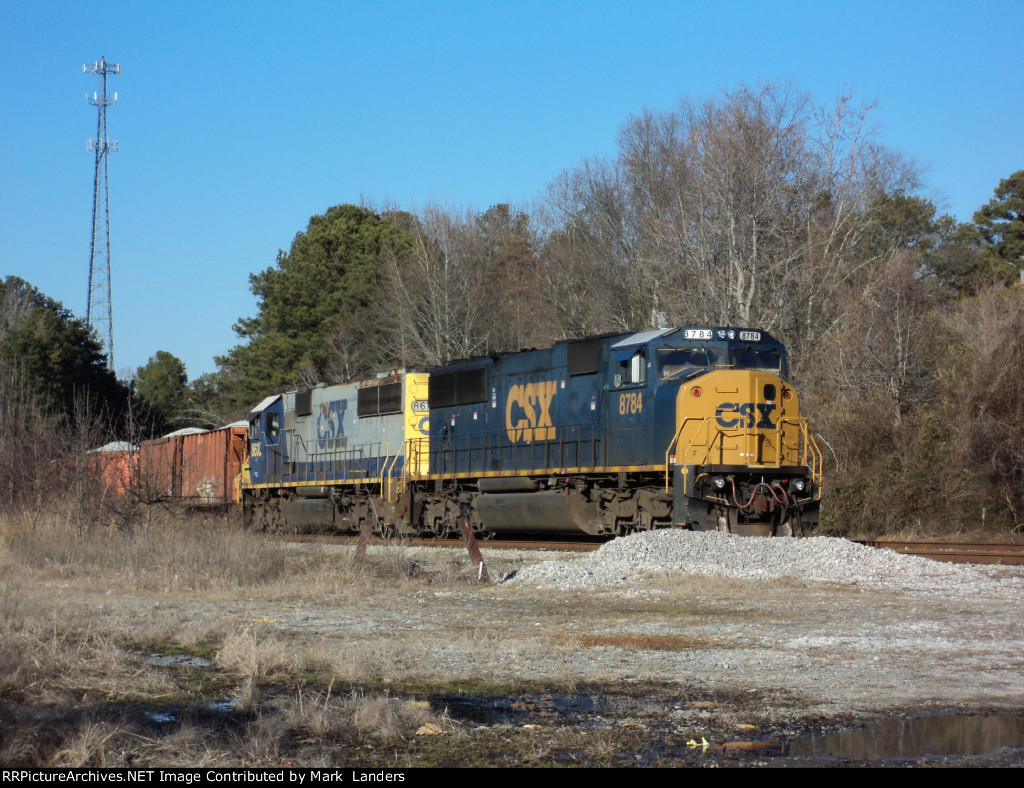 CSX 8784 leading a Loaded Ballast Train
